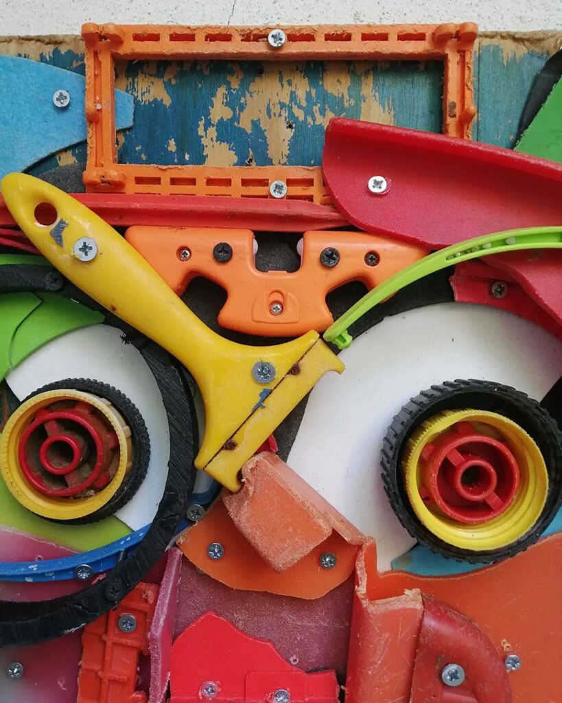 Surreal Faces Made From Plastic Trash